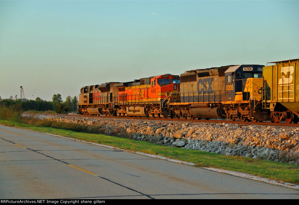 CSX 8205 runs 3rd out on this NB grain train.